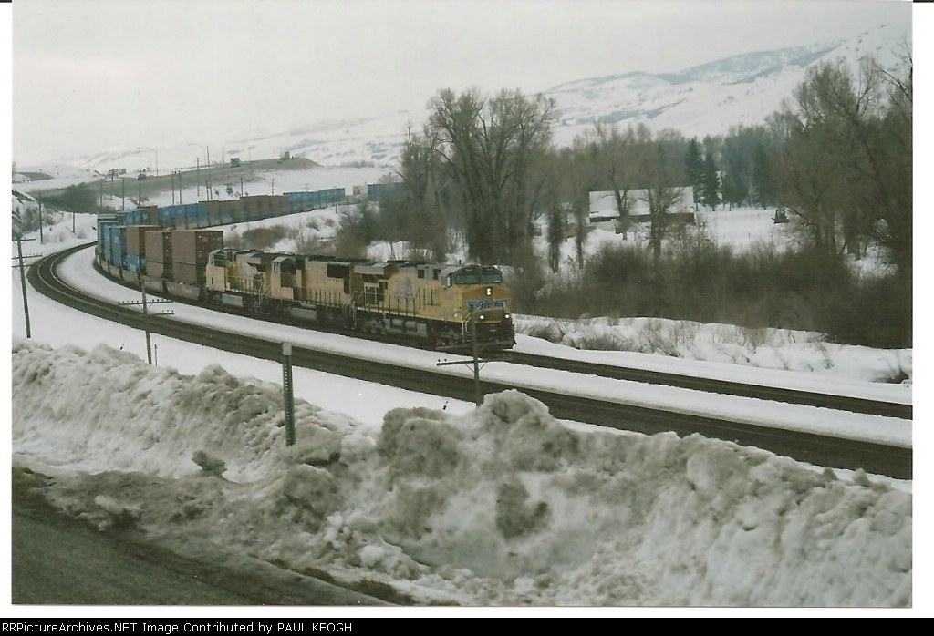 UP 7648 rolls south down the grade into Ogden, Utah